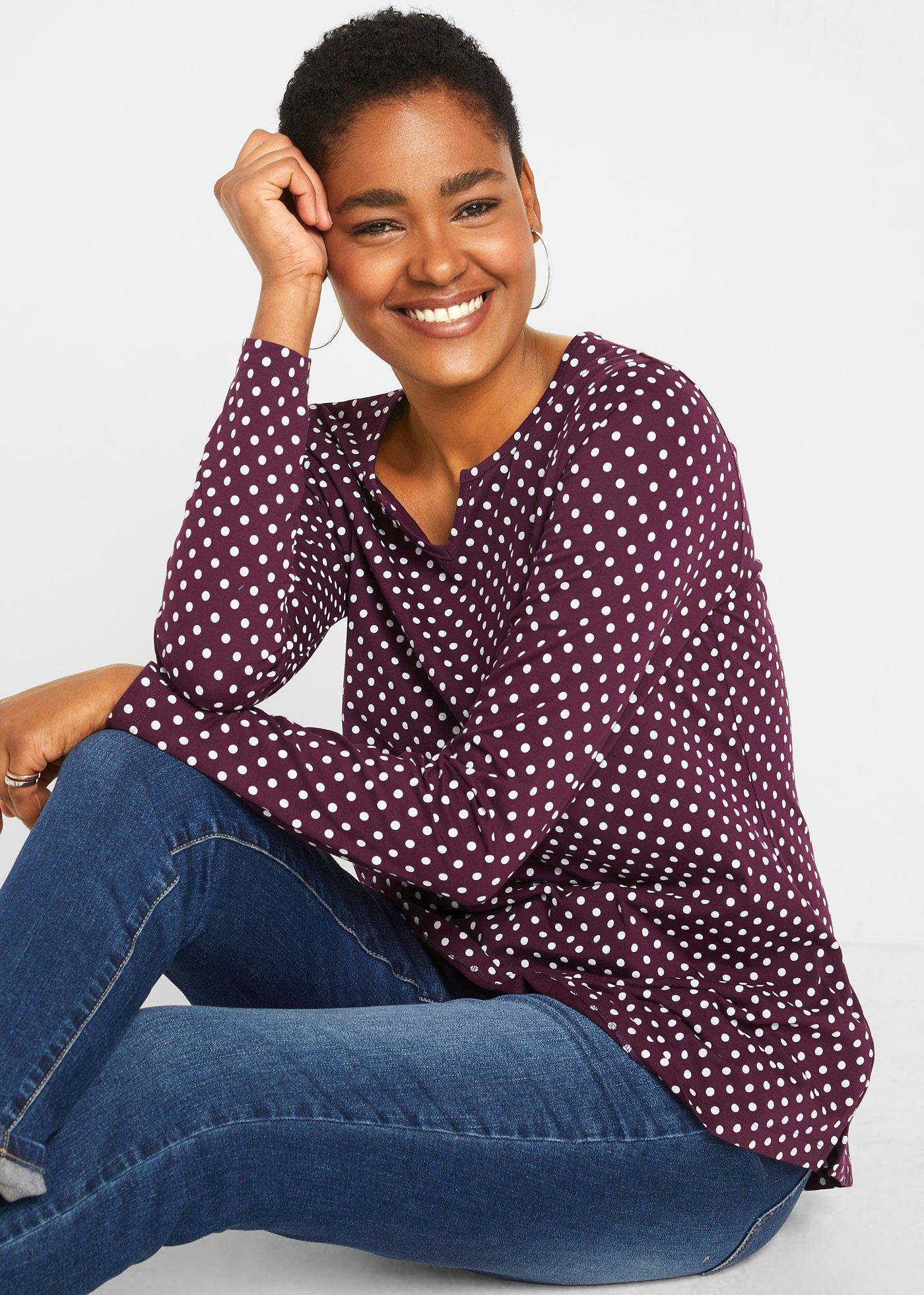 Lättmatchad prickig långärmad topp med slits i sidan för ökad ...